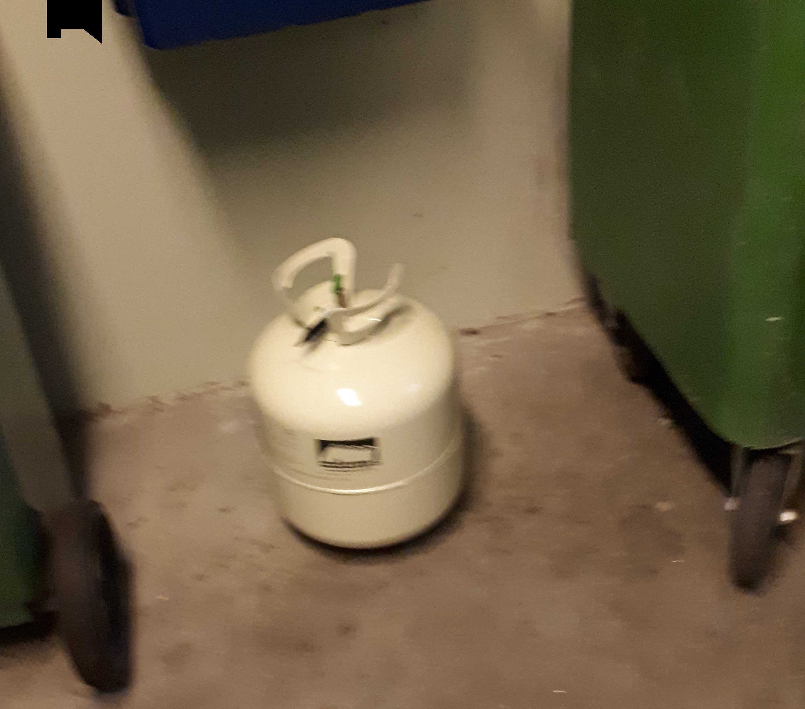 Gasflaska i miljöhus